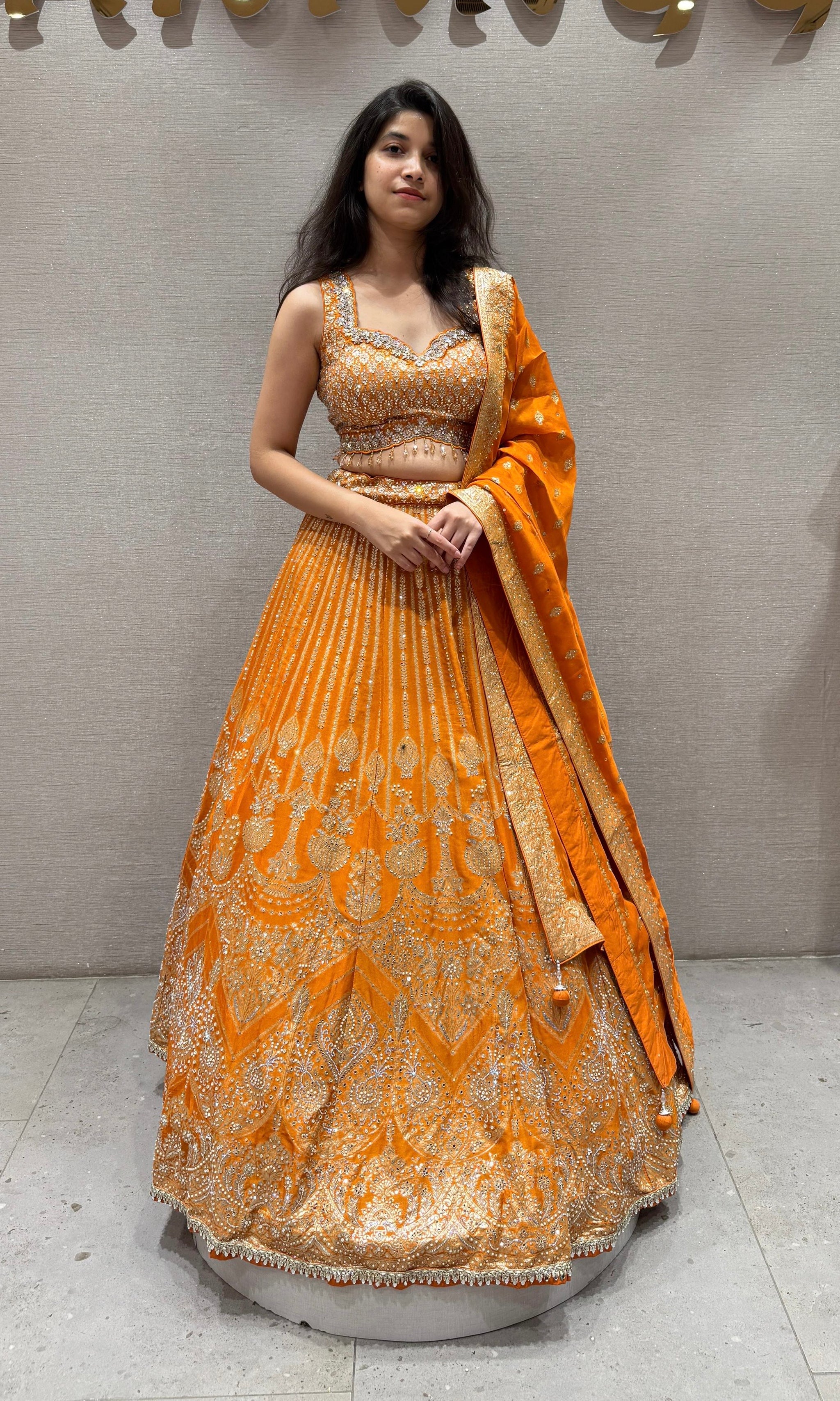 Orange and gold Embroidered Lehenga