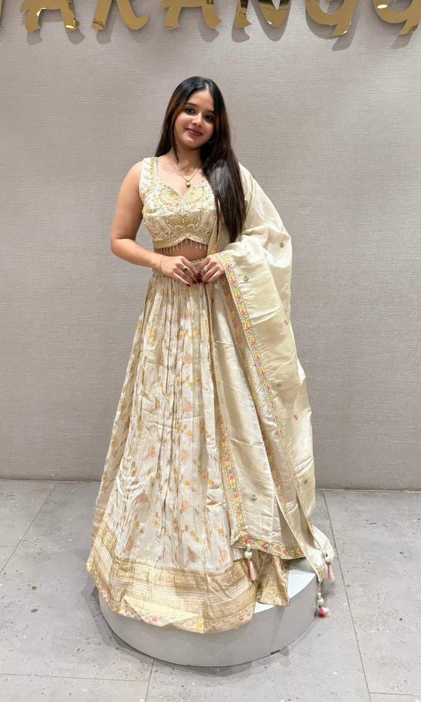 Pearl white lehenga with gold embroidered